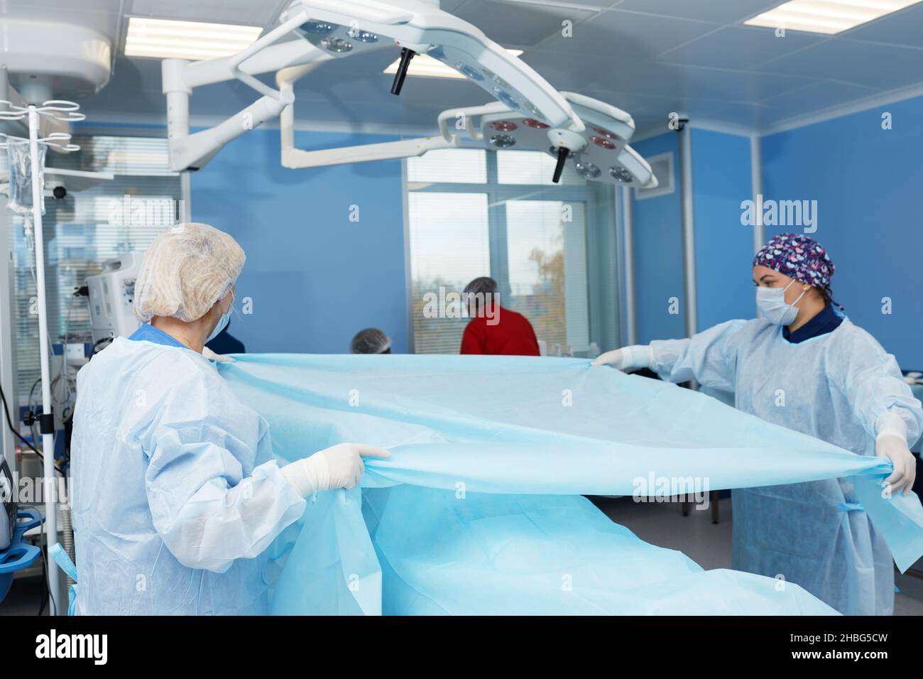 Concentrated Surgical team operating a patient in an operation theater ...
