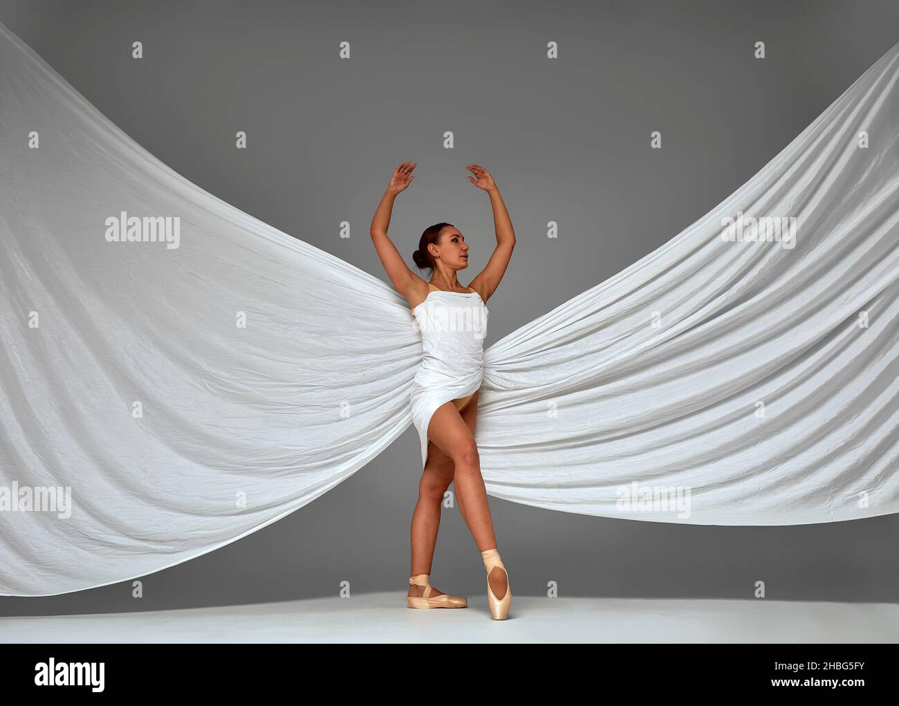 Ballerina Dancing with Silk Fabric, Modern Ballet Dancer in Fluttering ...