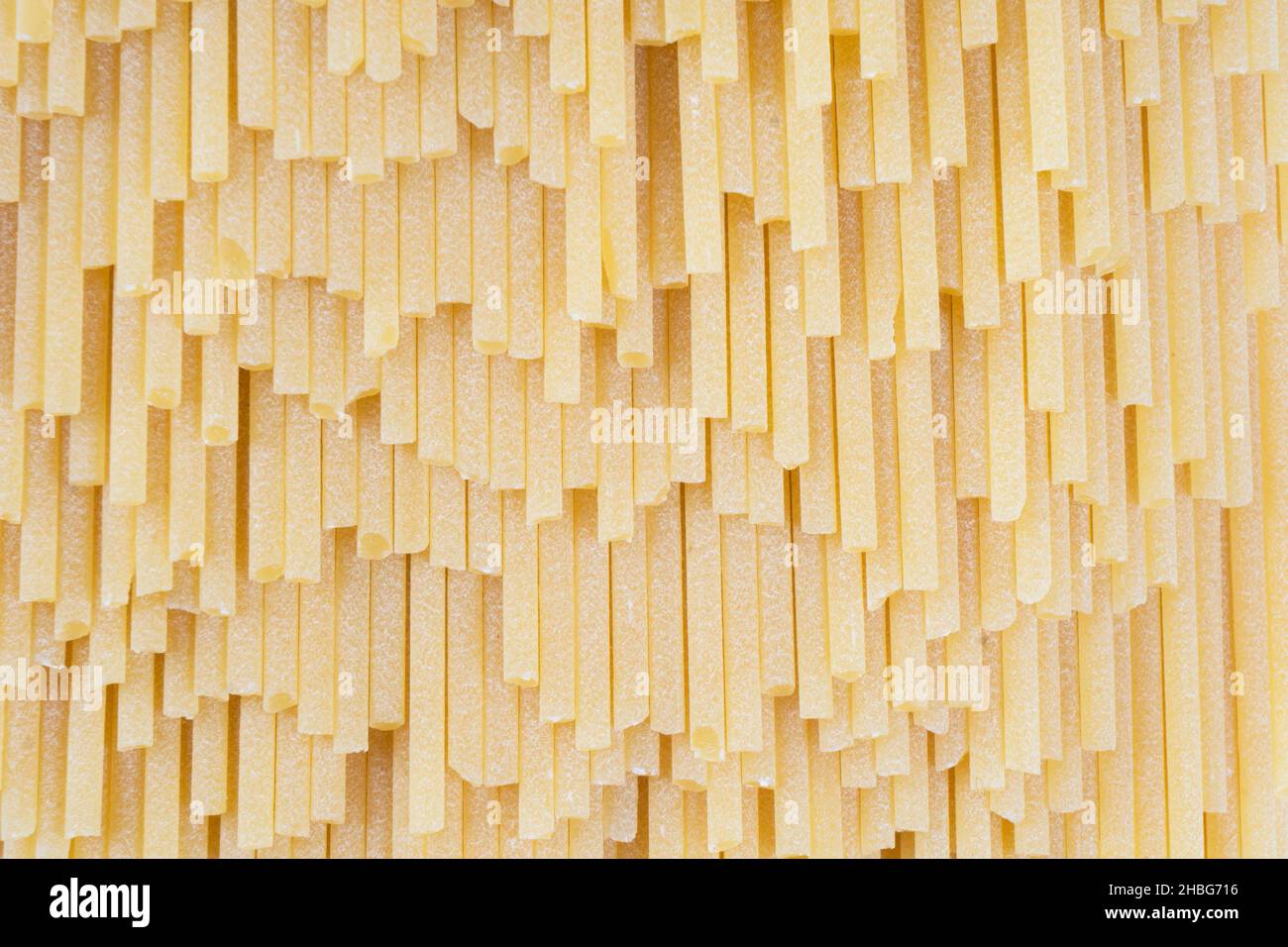 Uncooked dried spaghetti pasta background with clipping path. Macro ...