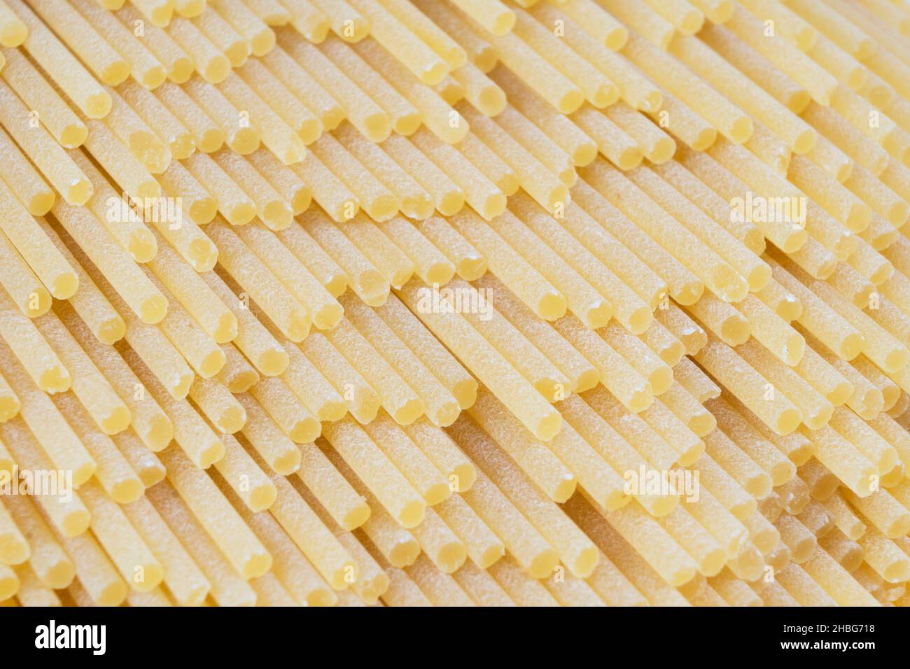 Uncooked dried spaghetti pasta background with clipping path. Macro ...