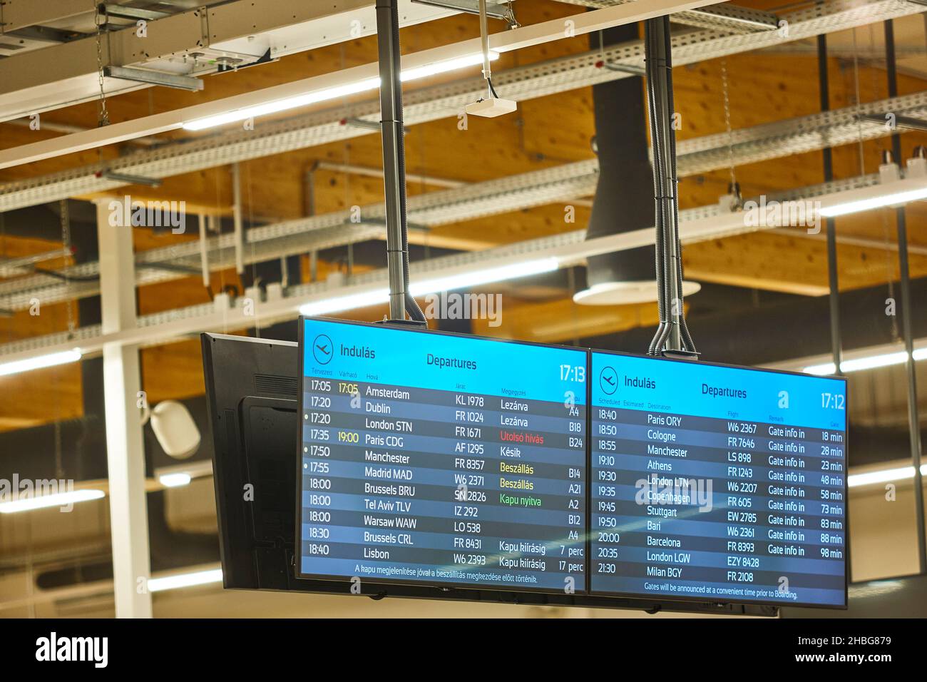 Airport boarding gates information displays. Flight schedule. Departure ...