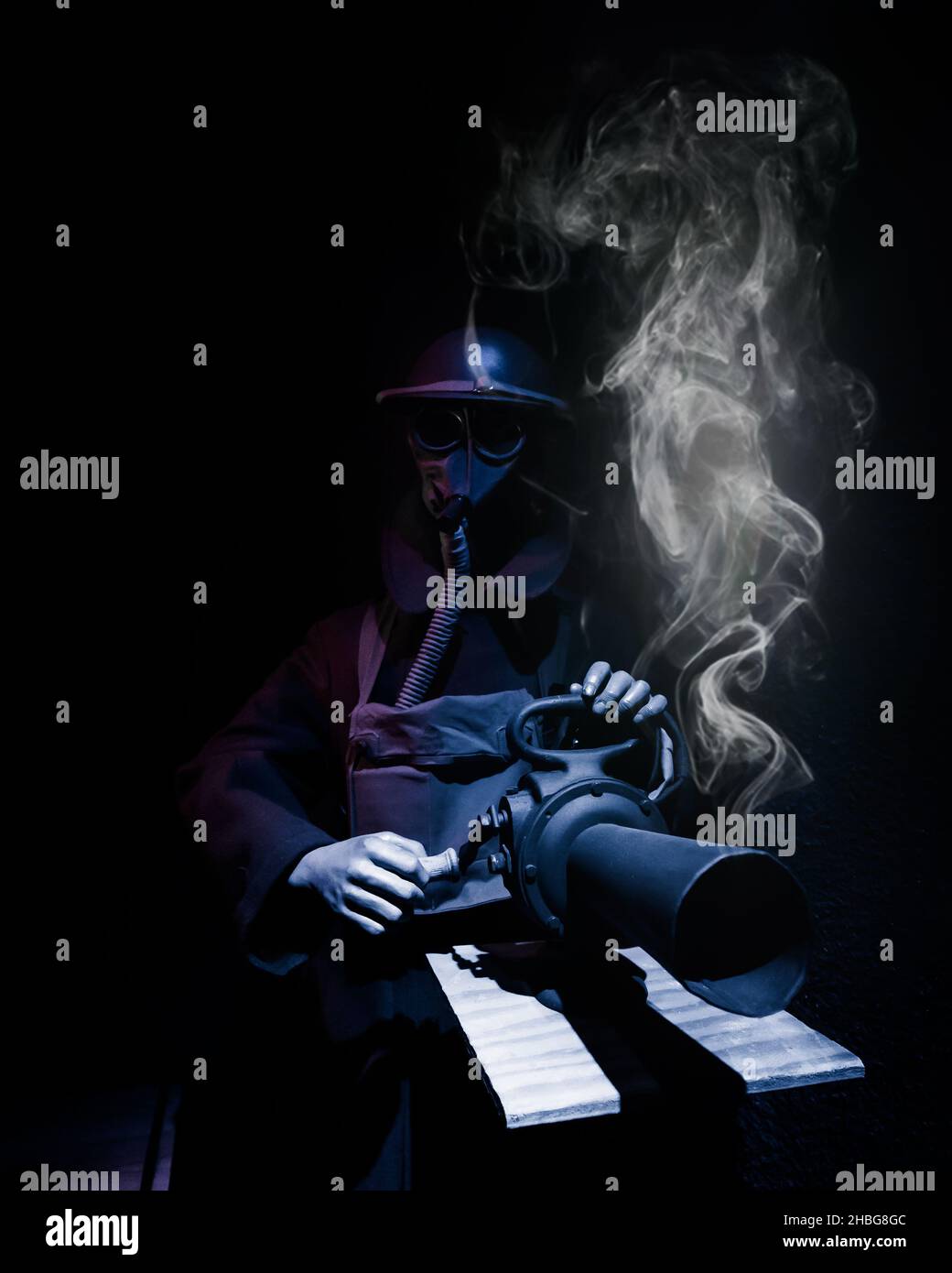 A vertical shot of a military chemical soldier statue with smoke ...