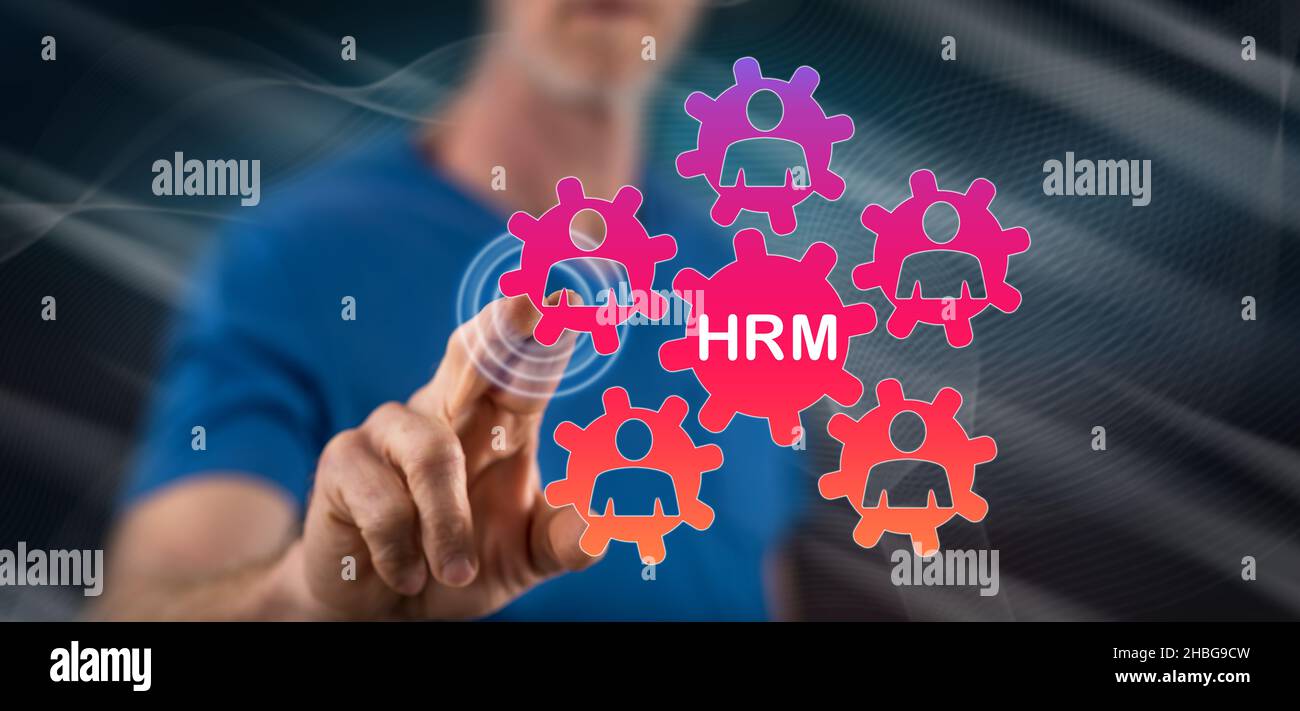 Man touching a hrm concept on a touch screen with his finger Stock ...