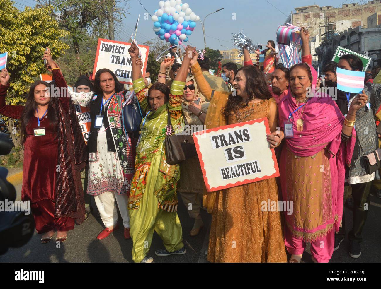 Lahore, Pakistan. 19th Dec, 2021. Pakistani members of Transgender ...