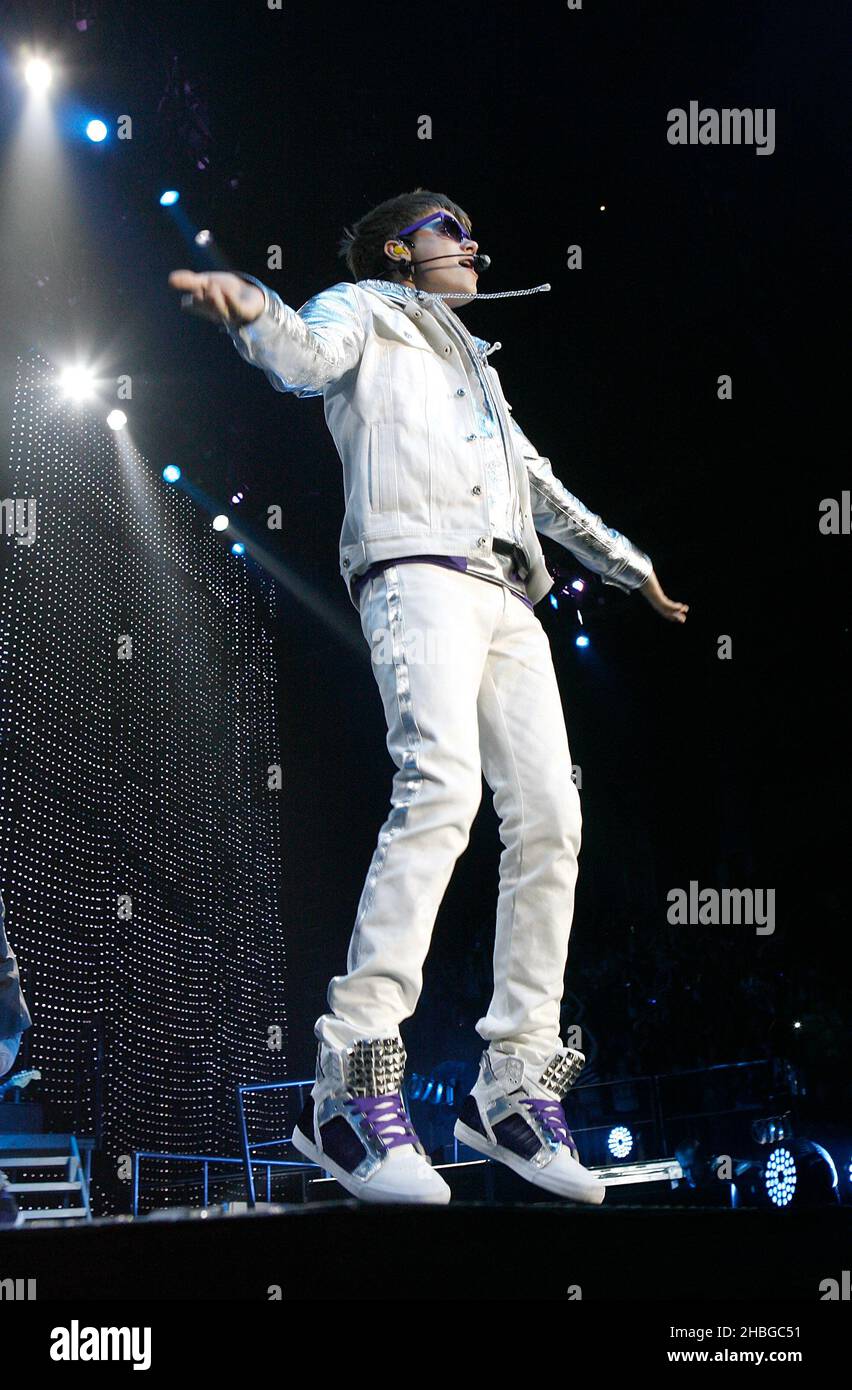 Justin Bieber performs on stage at the O2 Arena in London Stock Photo ...