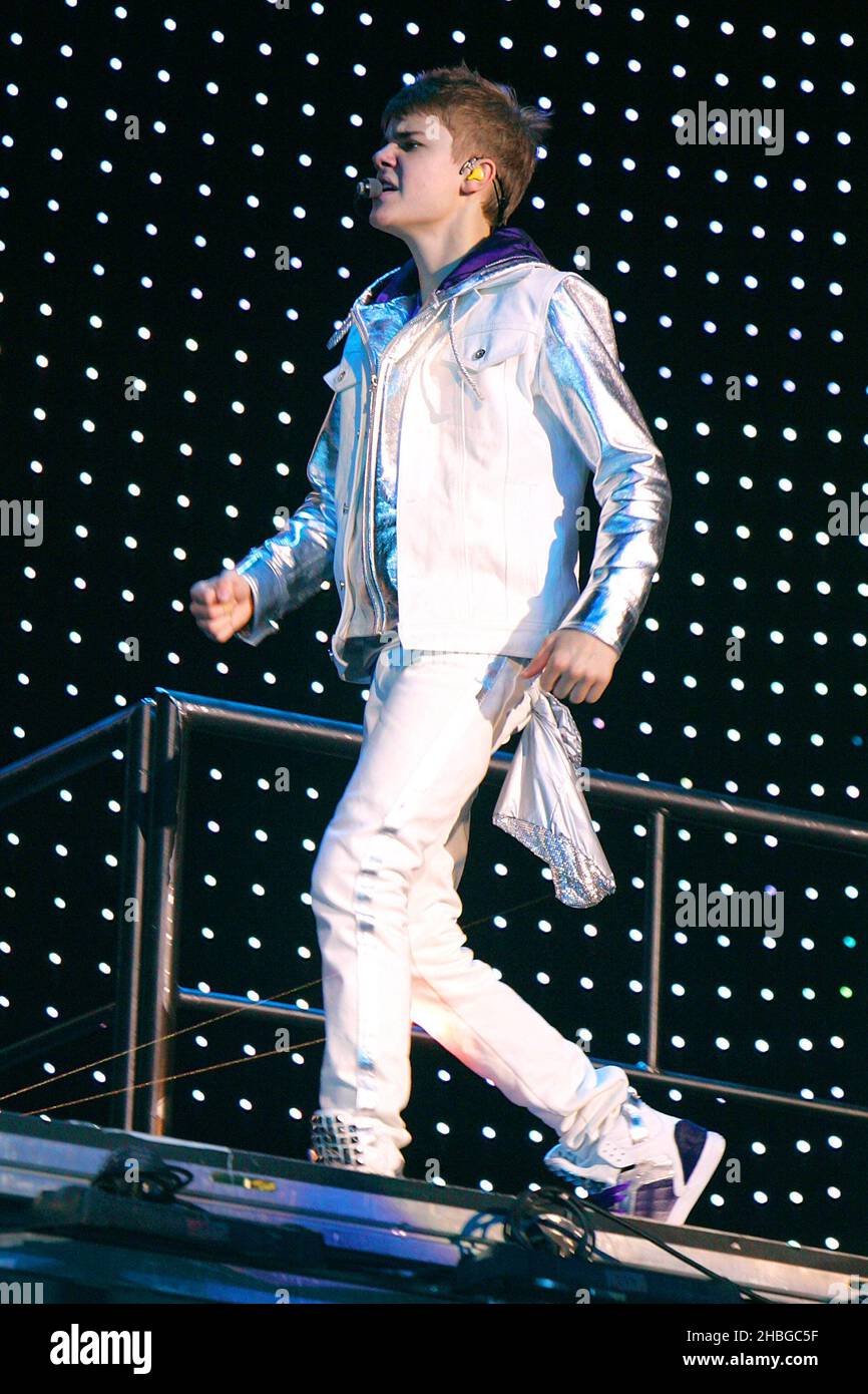 Justin Bieber performs on stage at the O2 Arena in London Stock Photo ...