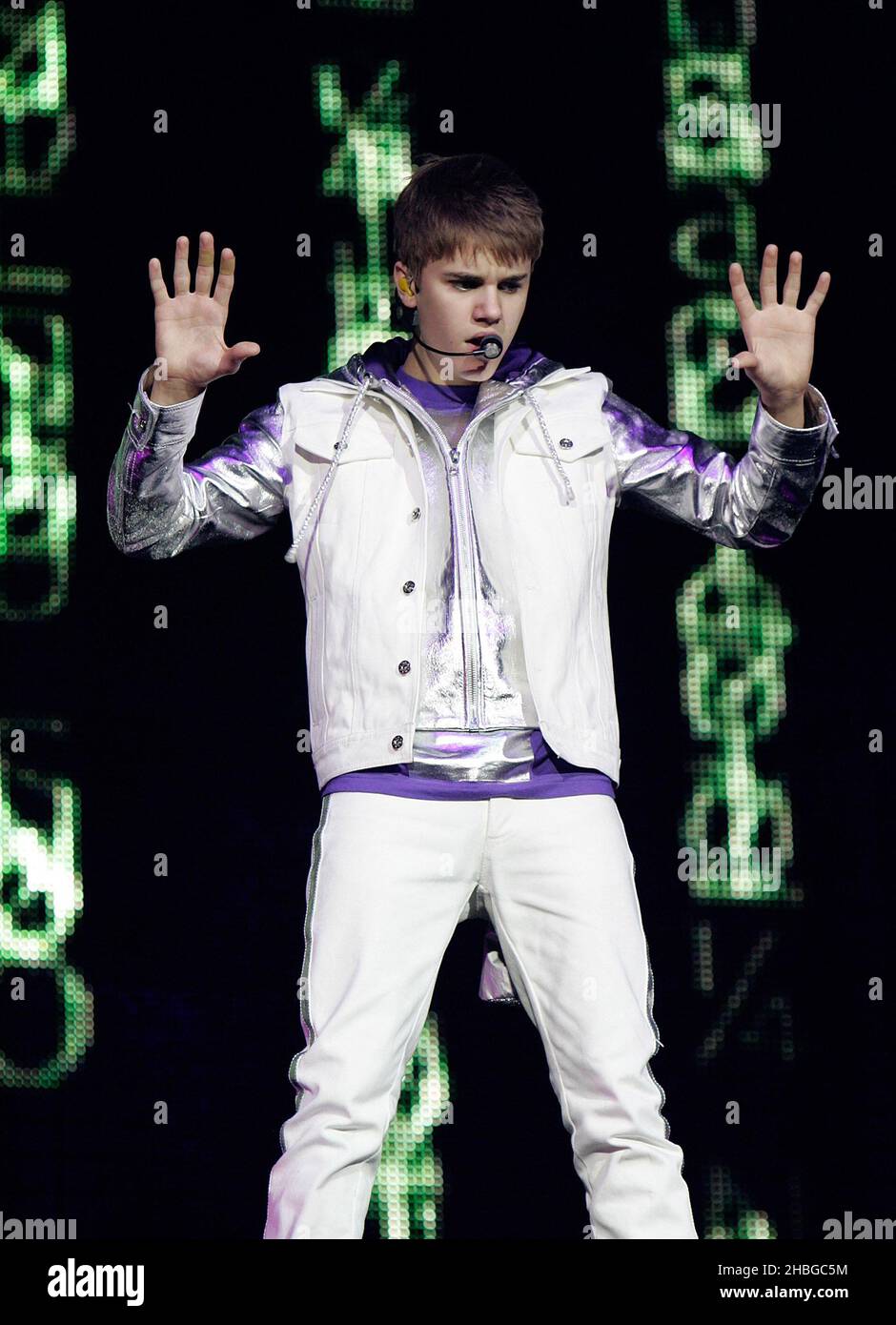 Justin Bieber performs on stage at the O2 Arena in London Stock Photo ...