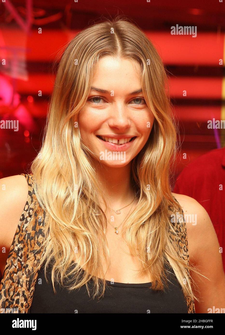 Jessica Hart poses in front of Neon Hart Clothing at Selfridges on ...