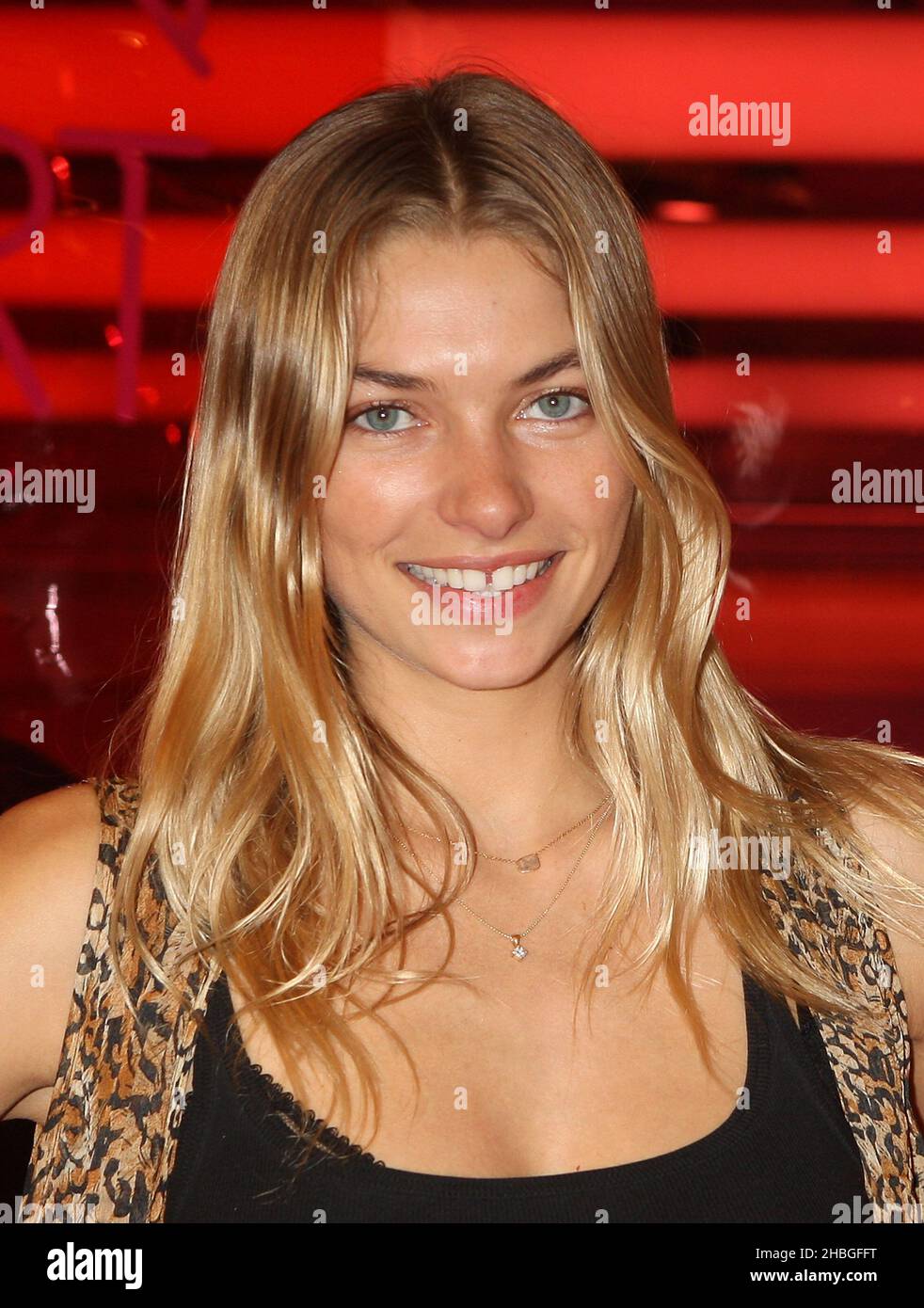 Jessica Hart poses in front of Neon Hart Clothing at Selfridges on ...