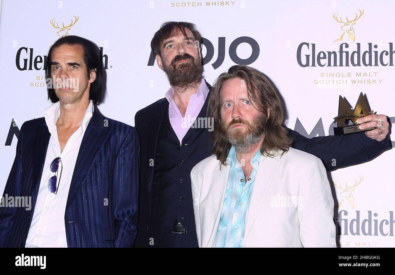 Nick Cave and the Bad Seeds with award at the Mojo Awards at The ...