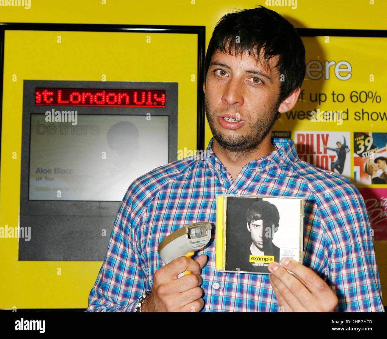 Example signs copies aka his new album, Playing In The Shadows, at HMV ...