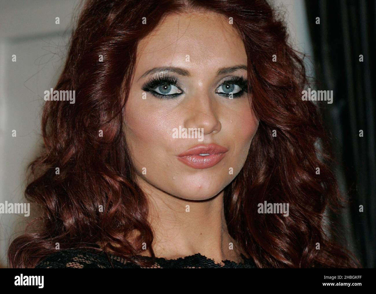 Amy Childs poses by her stand after a fashion show at the Britain and ...