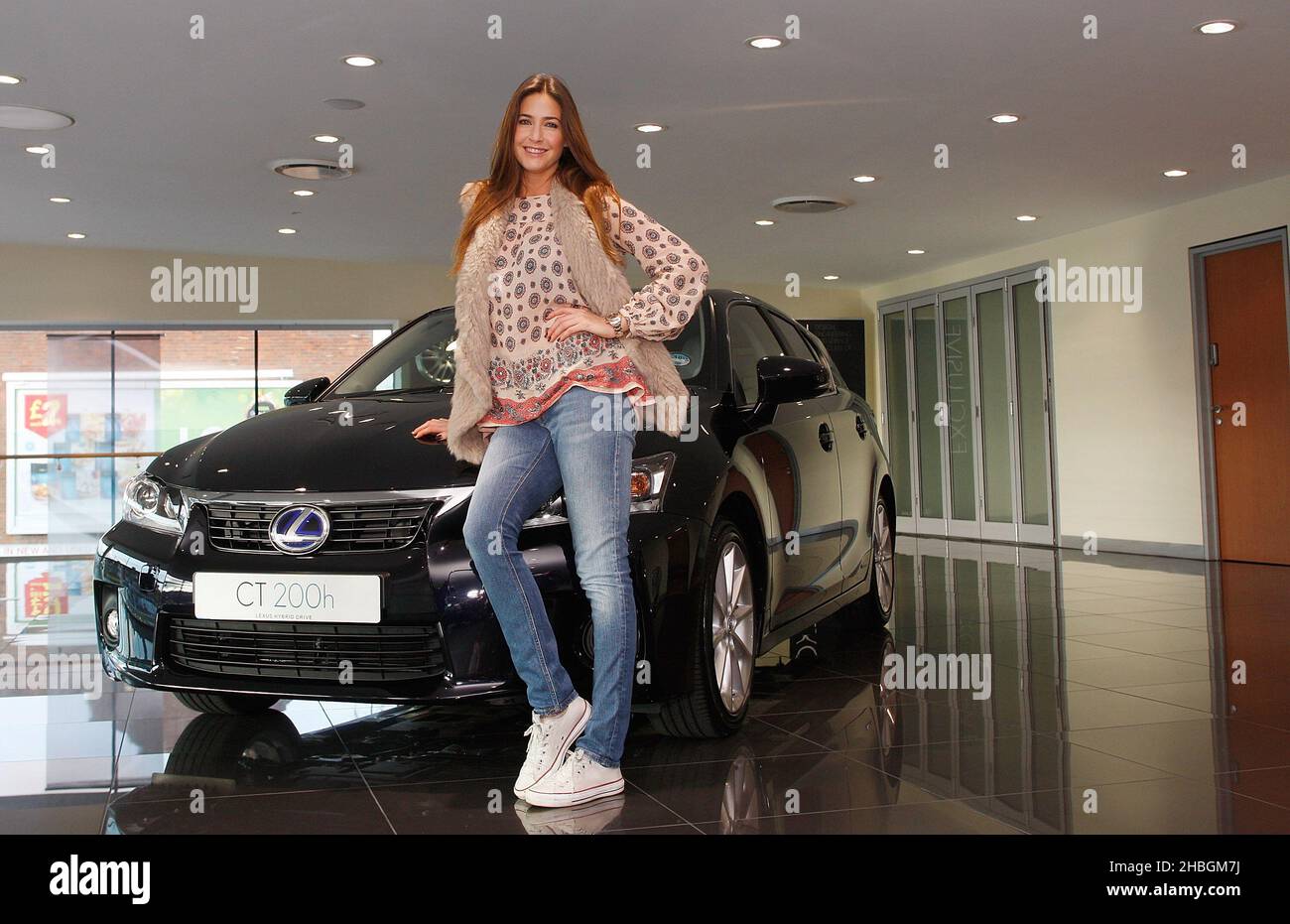 Lisa Snowdon is presented the keys to a Lexus CT200h hybrid car at the ...