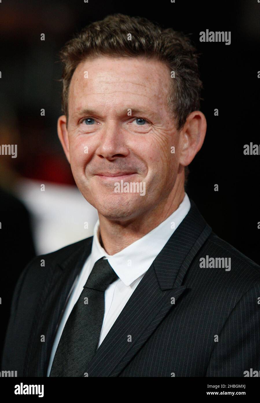 John Logan attending The Royal Film Premiere of 'Hugo' at The Odeon ...