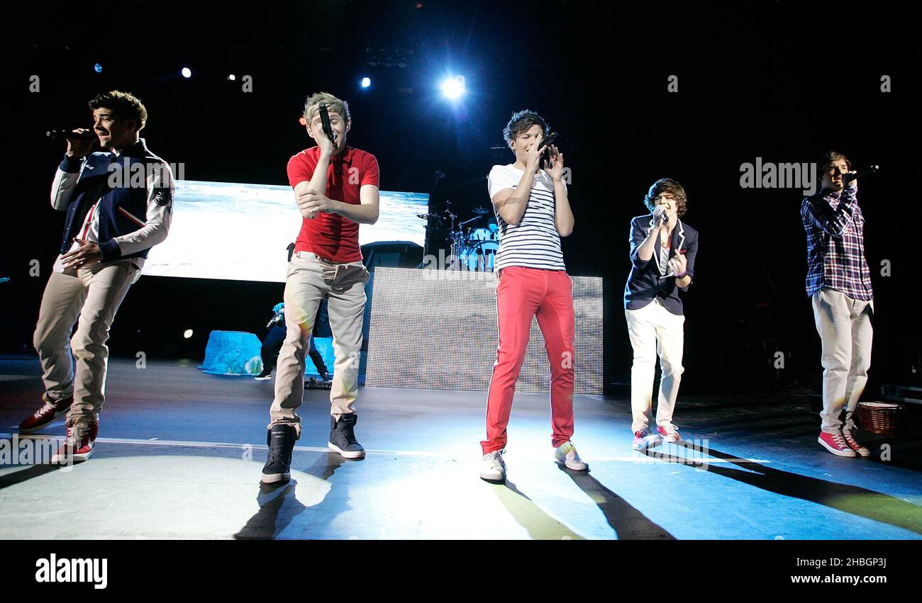 One direction performing live concert hi-res stock photography and ...