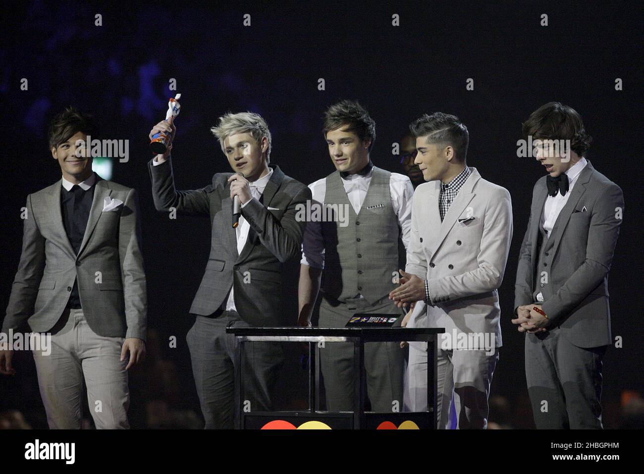 One Direction accept the award for Best British Single during the 2012 ...