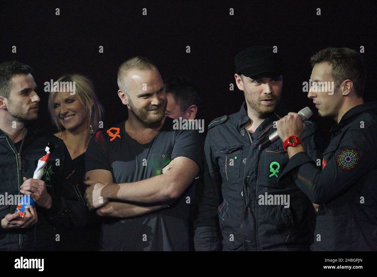 Coldplay accept the award for Best British Group during the 2012 Brit ...