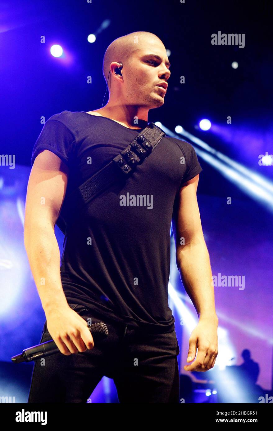 Max George of The Wanted performs on stage at the O2 Arena in London ...