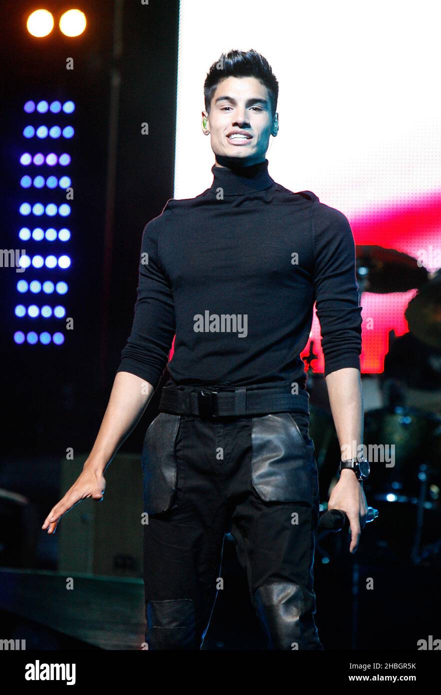 Siva Kaneswaran of The Wanted performs on stage at the O2 Arena in ...