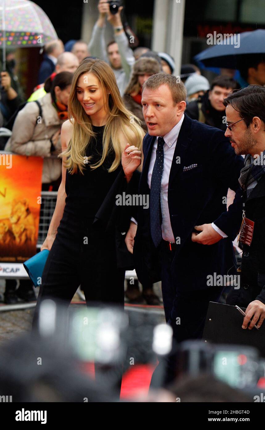 Guy Ritchie and girlfriend Jacqui Ainsley attend the Uk Film Premiere ...