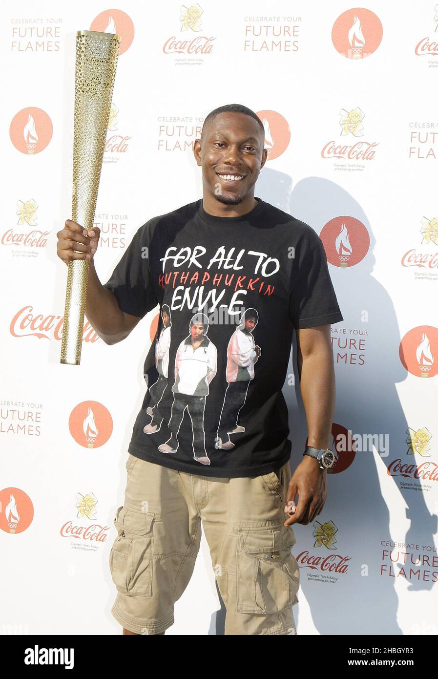 Dizzee Rascal poses backstage with the Torch at Coca-Cola's London 2012 ...