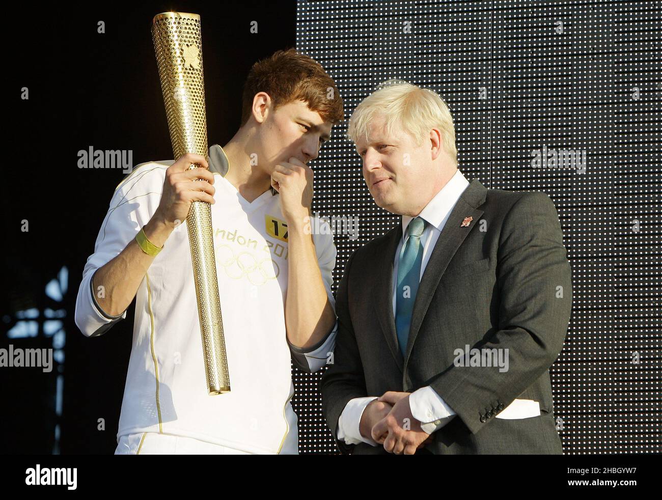 Tyler Rix and Mayor Boris Johnson with the Olympic Torch at Coca-Cola's ...
