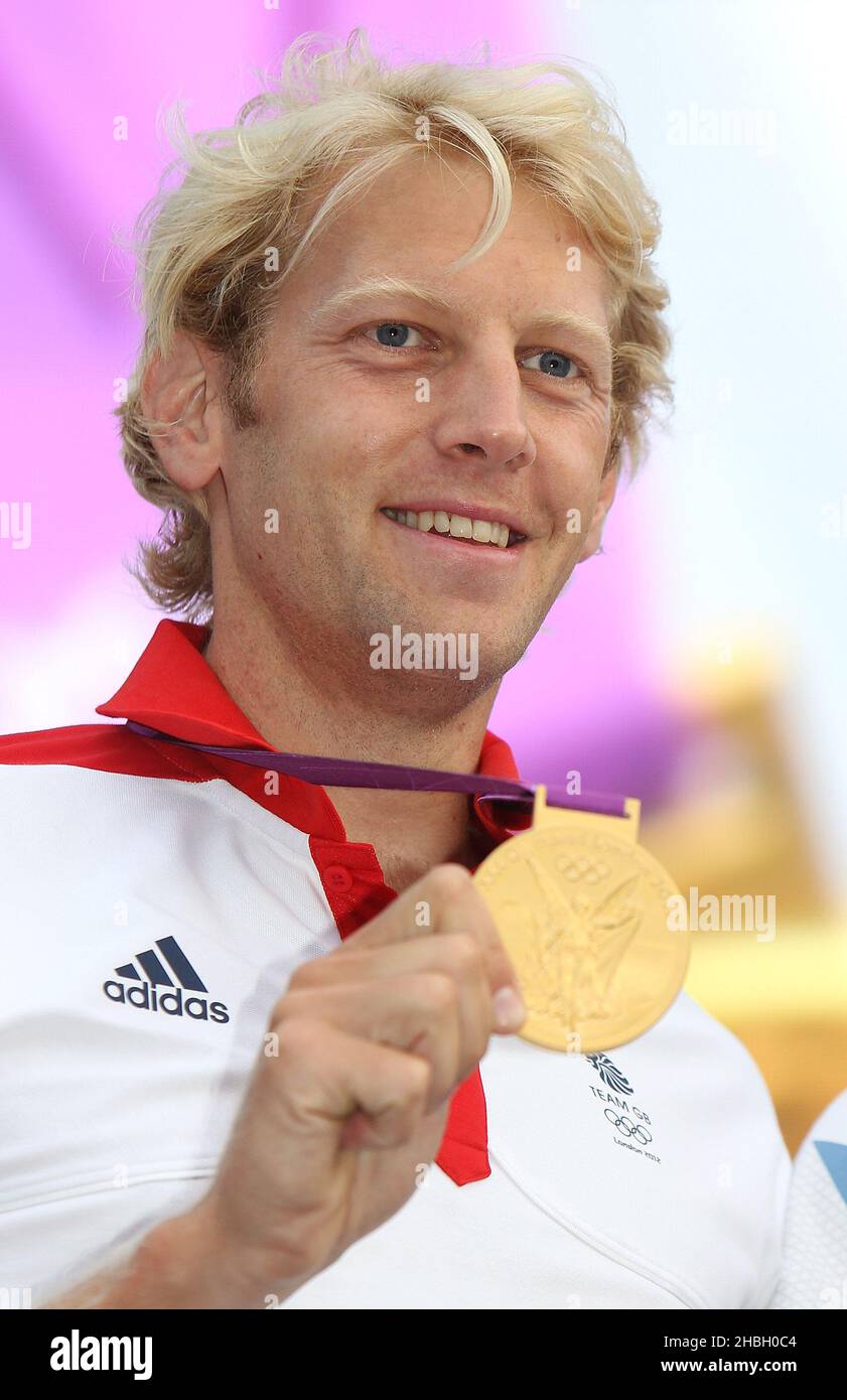 Andrew Triggs-Hodge shows off his Gold Medal won in the Rowing Men Four ...
