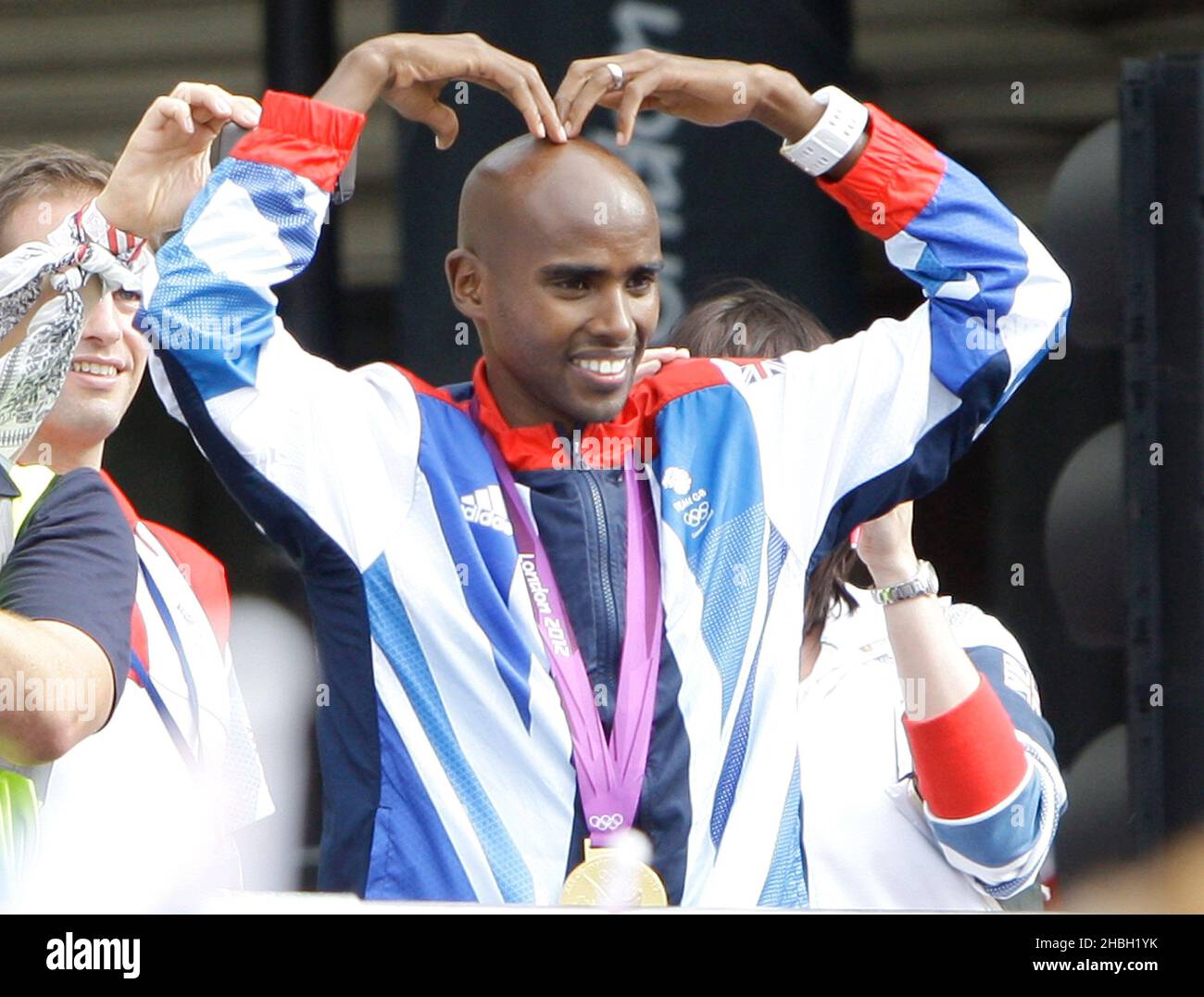 Mo Farah, Sprinter and Gold medalist, does the Mo-Bot as the parade ...