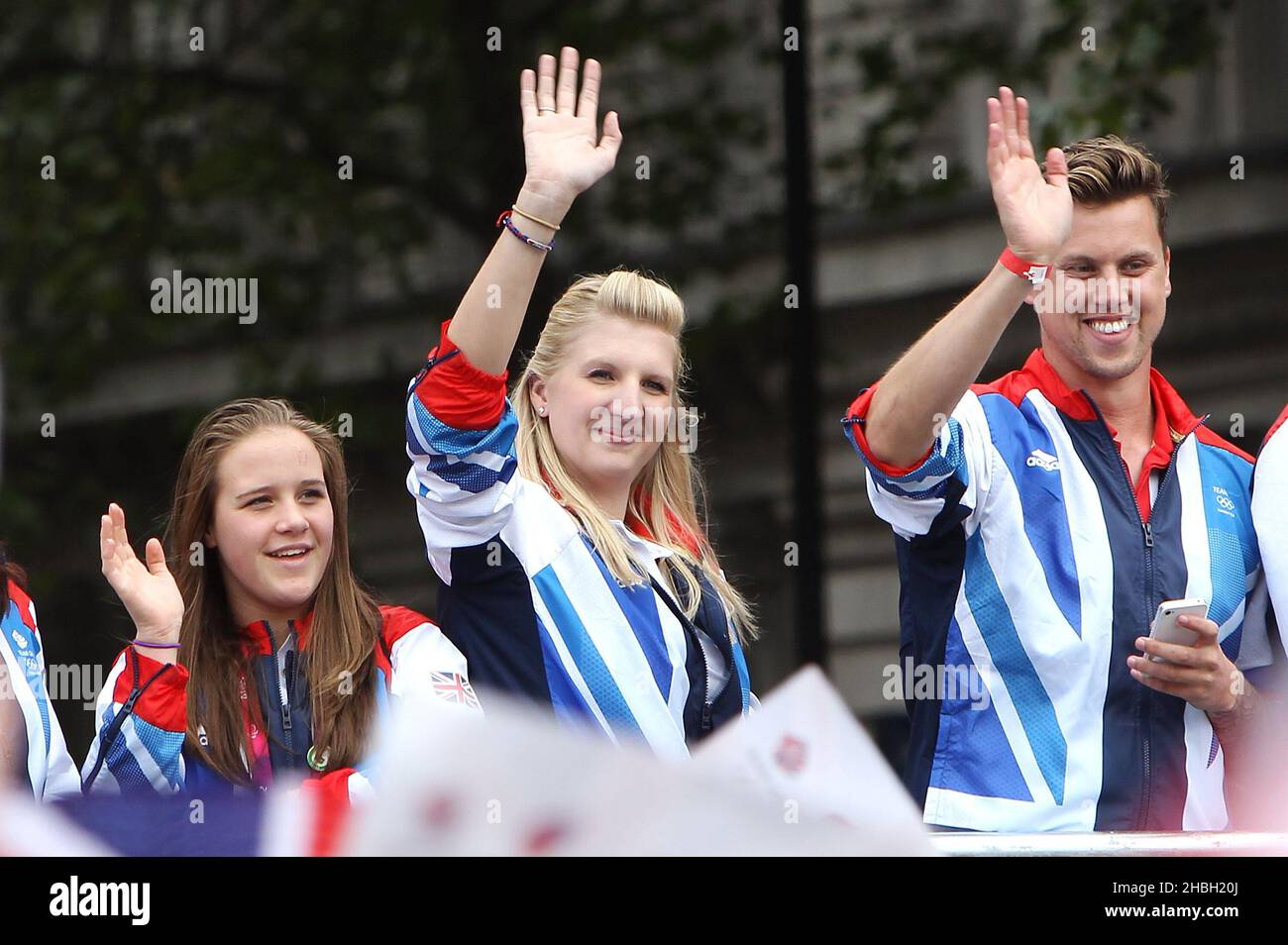 Rebecca Adlington, silver medalist swimmer, waves as the parade ...
