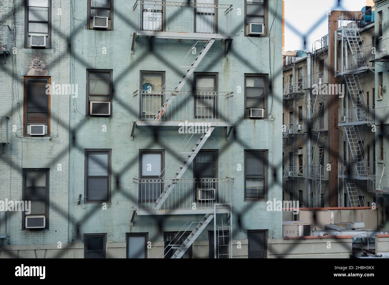 A selective focus shot of New York City urban apartment buildings ...