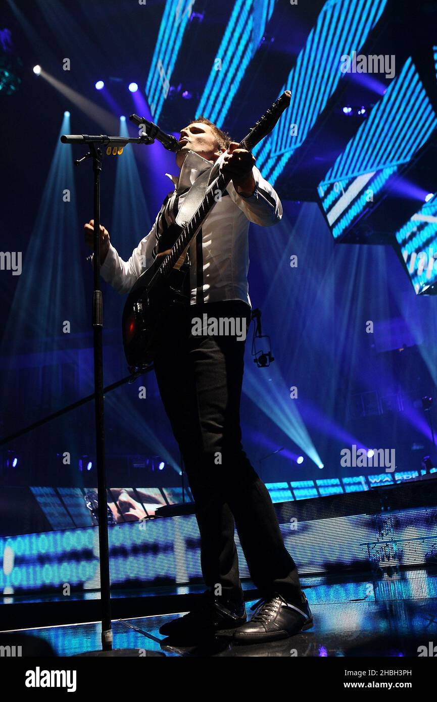 Matt Bellamy of Muse performs on stage at the 02 Arena in London Stock ...