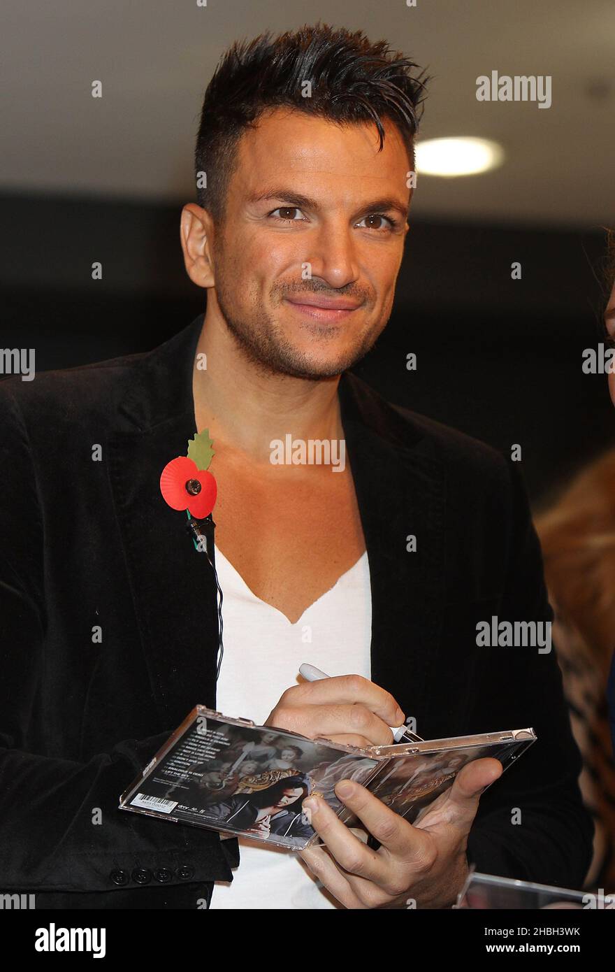 Peter Andre signs copies of his new album "Angels And Demons" and his ...