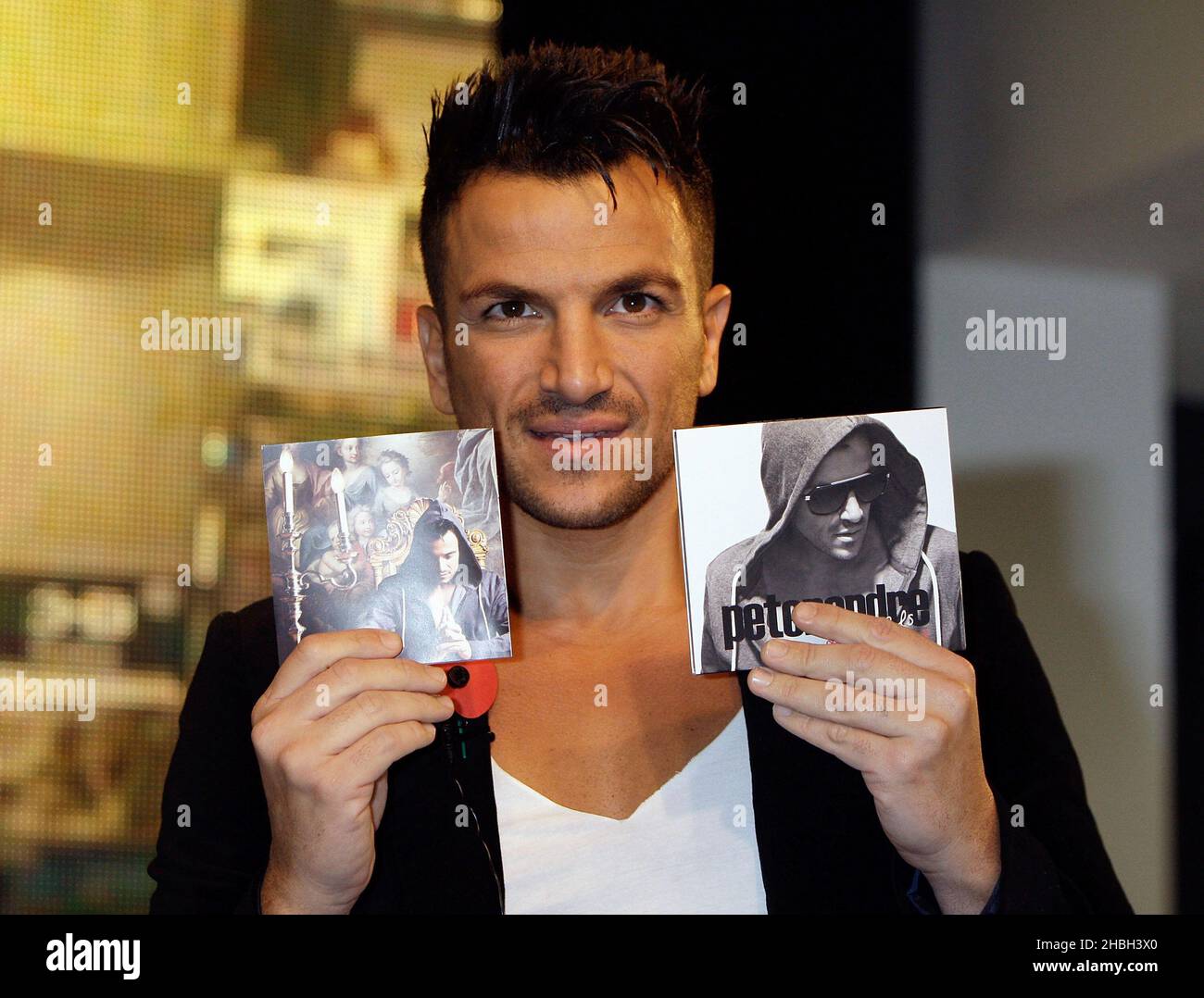 Peter Andre signs copies of his new album "Angels And Demons" and his ...