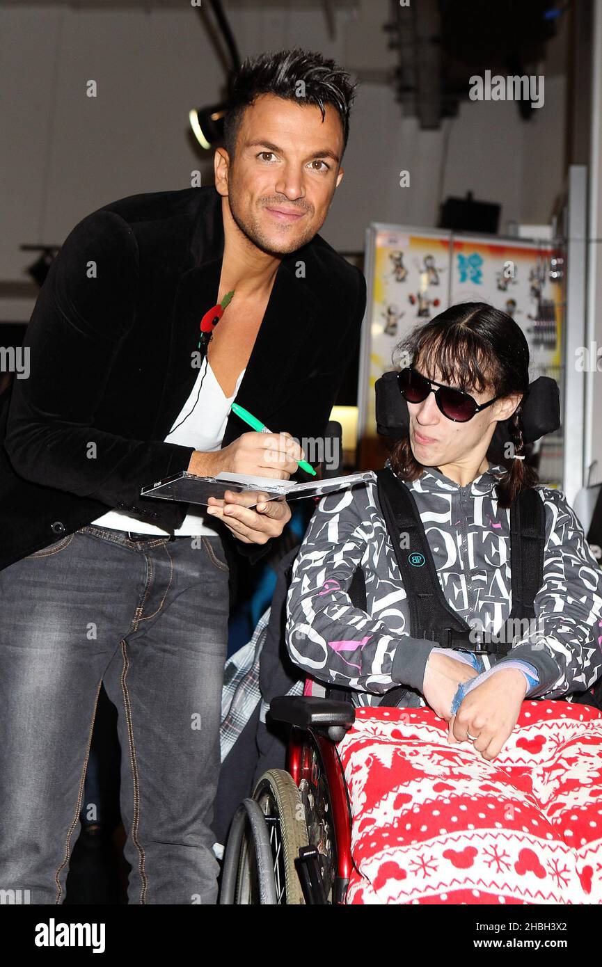 Peter Andre signs copies of his new album "Angels And Demons" and his ...
