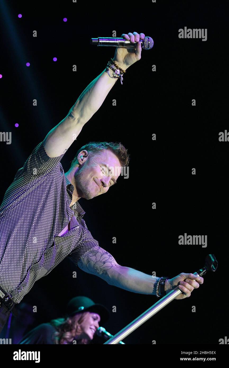 Ronan Keating performs on stage at the 02 Arena in East London Stock ...