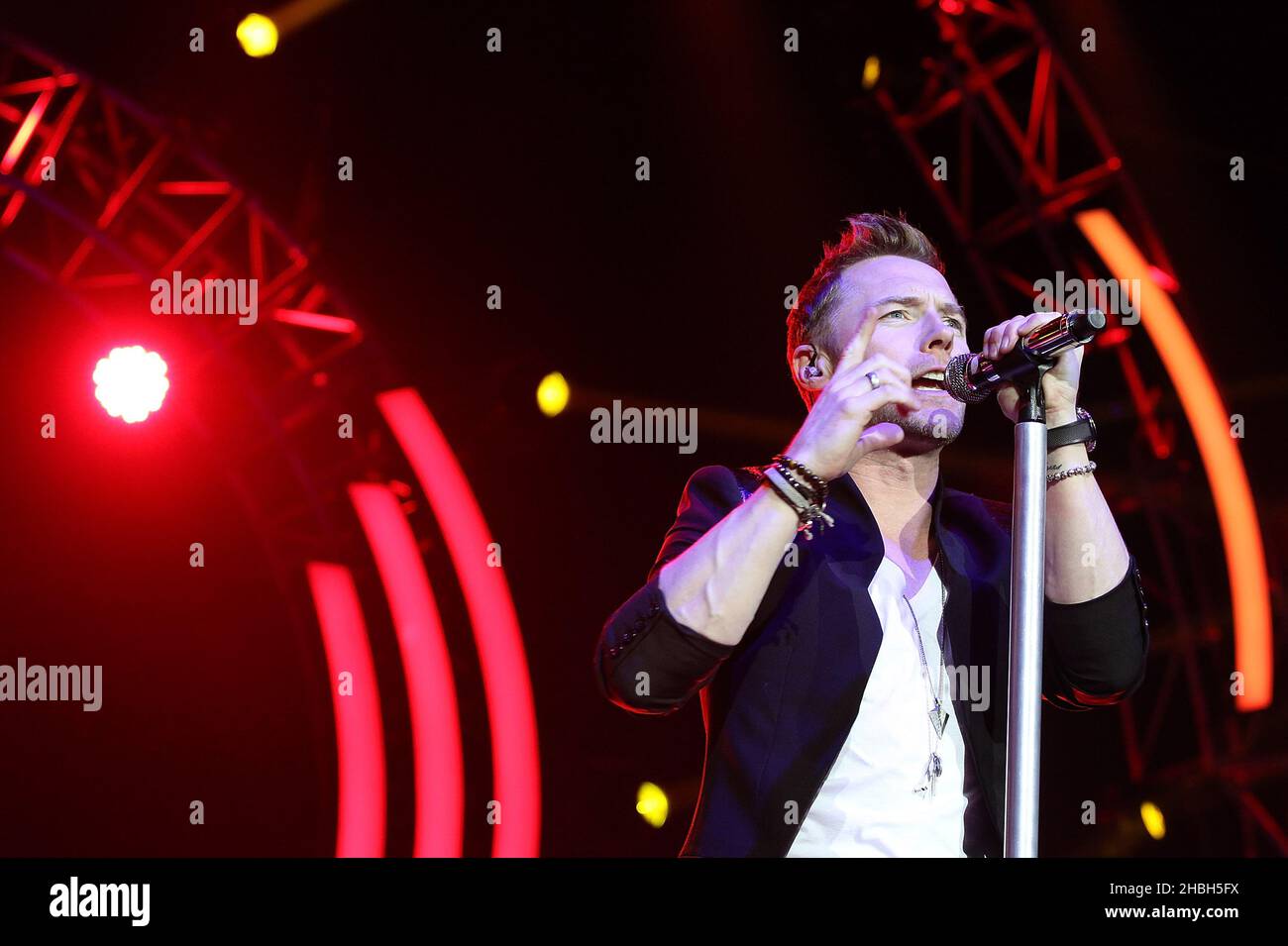 Ronan Keating performs on stage at the 02 Arena in East London Stock ...