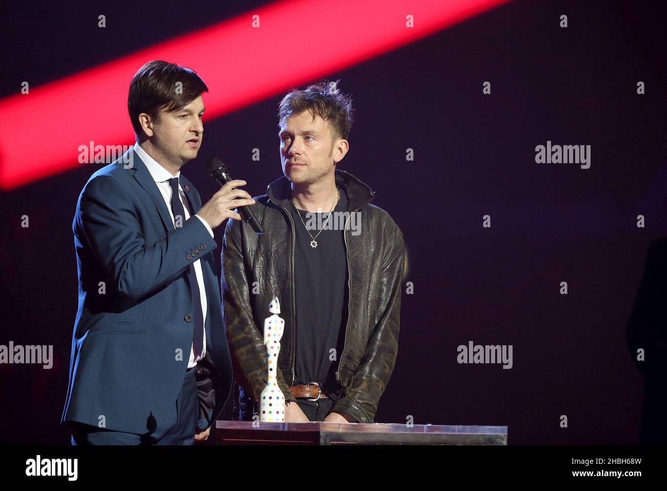 Ben Knowles and Damon Albarn accepting the Special Award for War Child ...