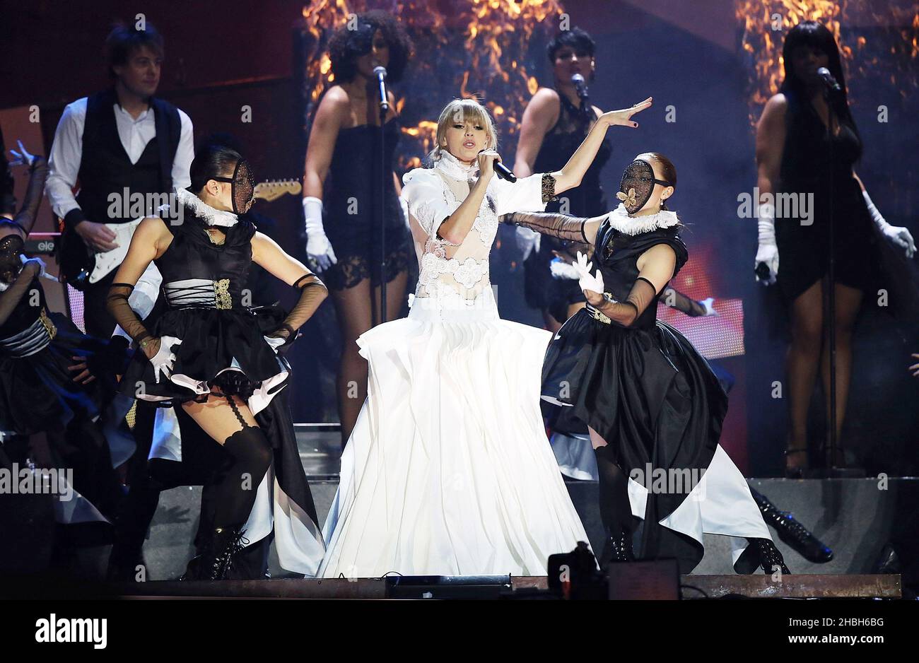 Taylor Swift performs on stage at the 2013 Brit Awards at the O2 Arena ...