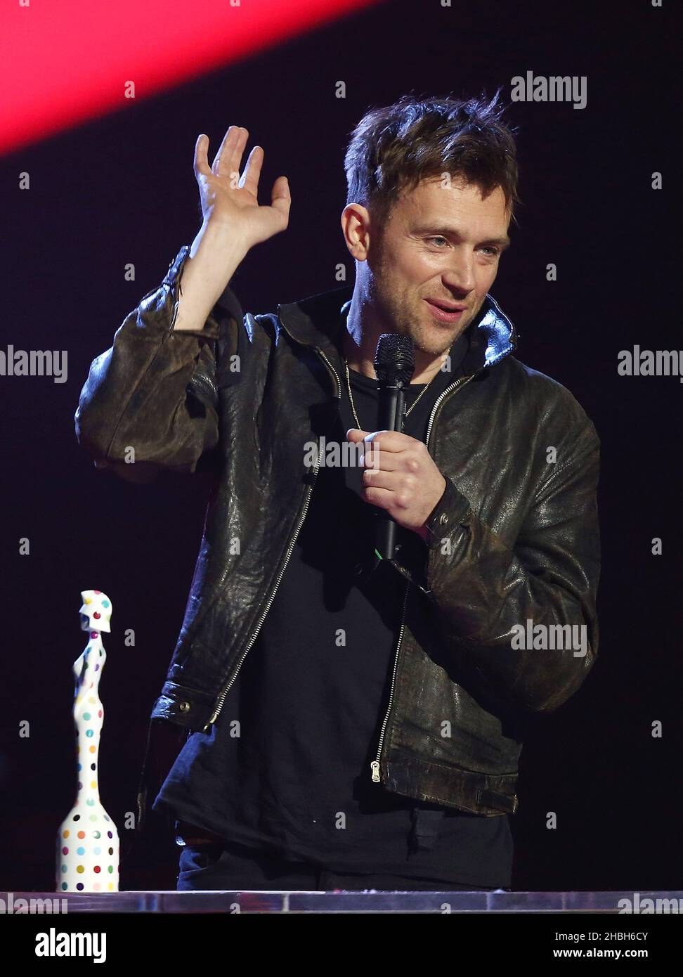 Damon Albarn accepting the Special Award for War Child from Ben Knowles ...