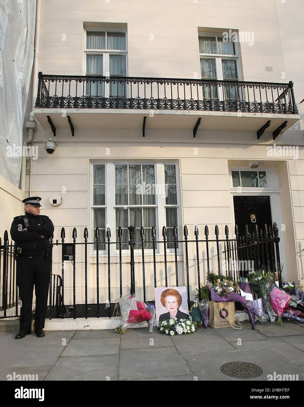 Tributes to the late Margaret Thatcher outside her home at 74 Chester ...