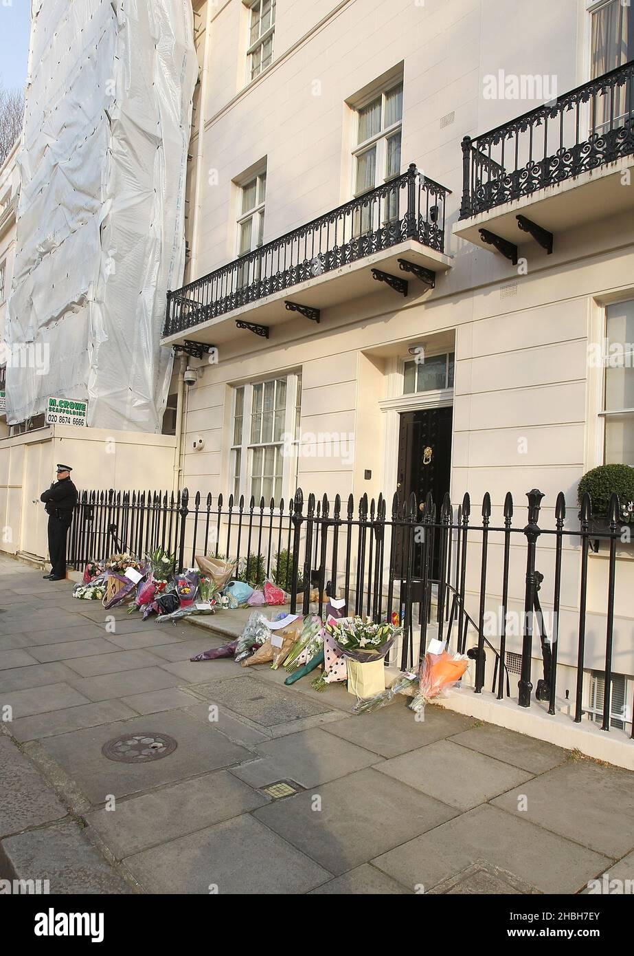 Tributes to the late Margaret Thatcher outside her home at 74 Chester ...