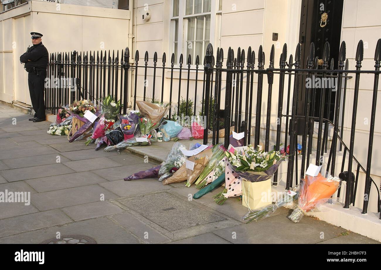 Tributes to the late Margaret Thatcher outside her home at 74 Chester ...