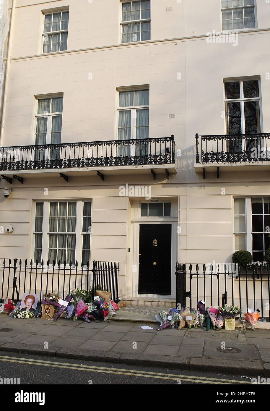 Tributes to the late Margaret Thatcher outside her home at 74 Chester ...