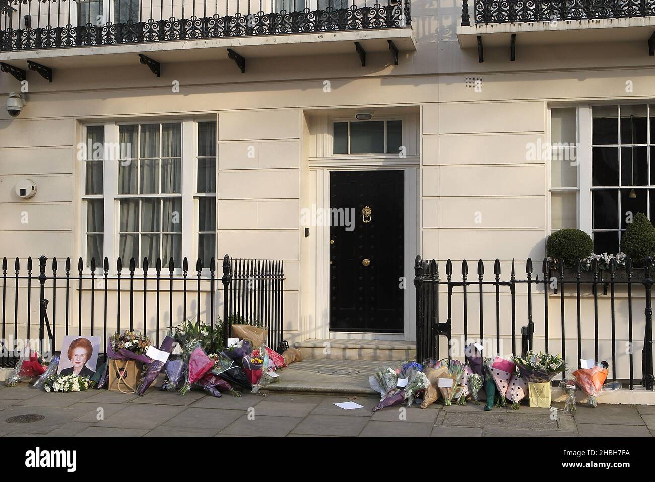 Tributes to the late Margaret Thatcher outside her home at 74 Chester ...