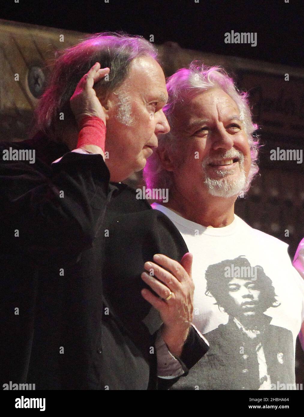 Neil Young performs on stage at the 02 Arena in London Stock Photo - Alamy