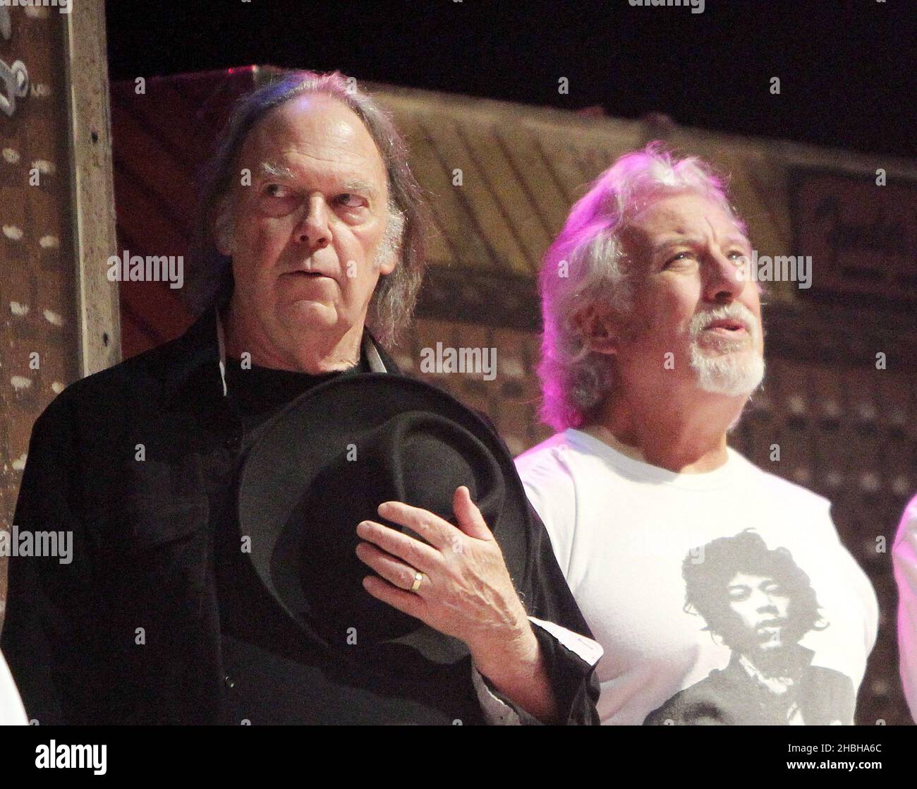 Neil Young performs on stage at the 02 Arena in London Stock Photo - Alamy