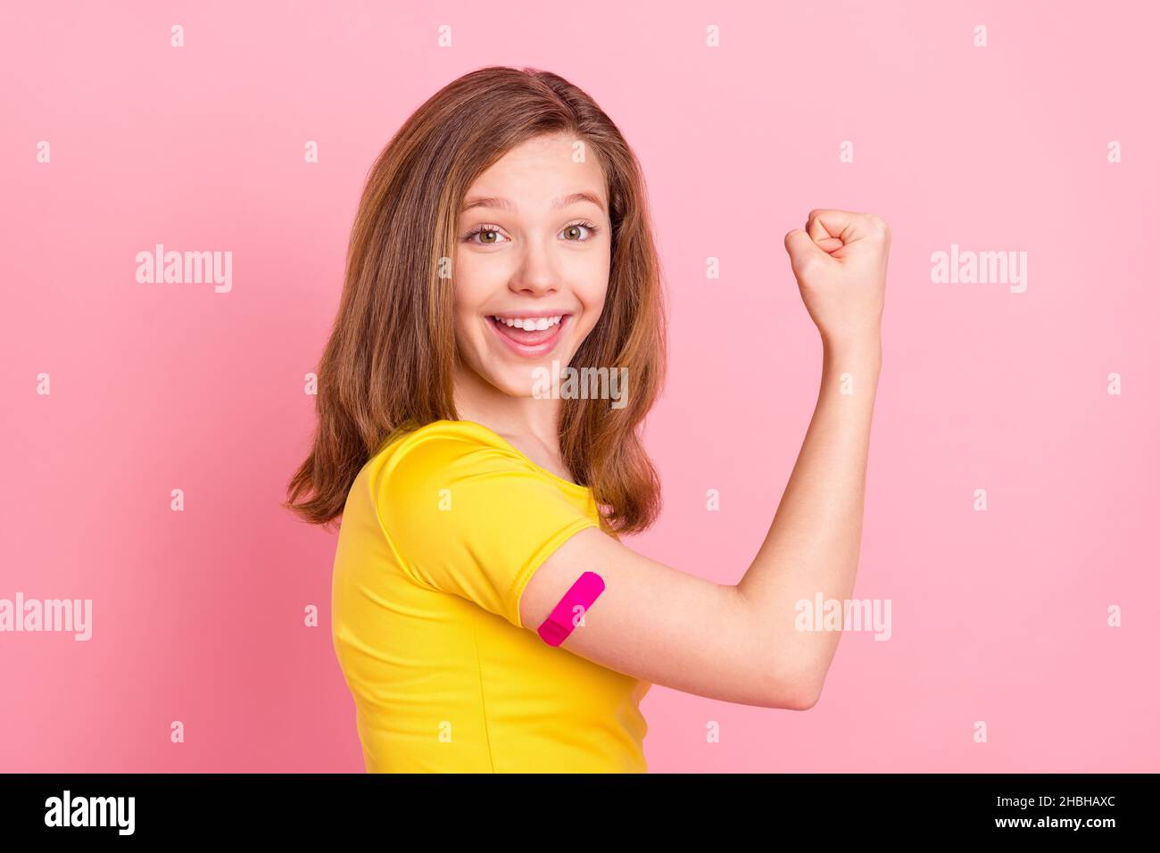Profile side photo of young girl happy positive smile show arm muscles ...