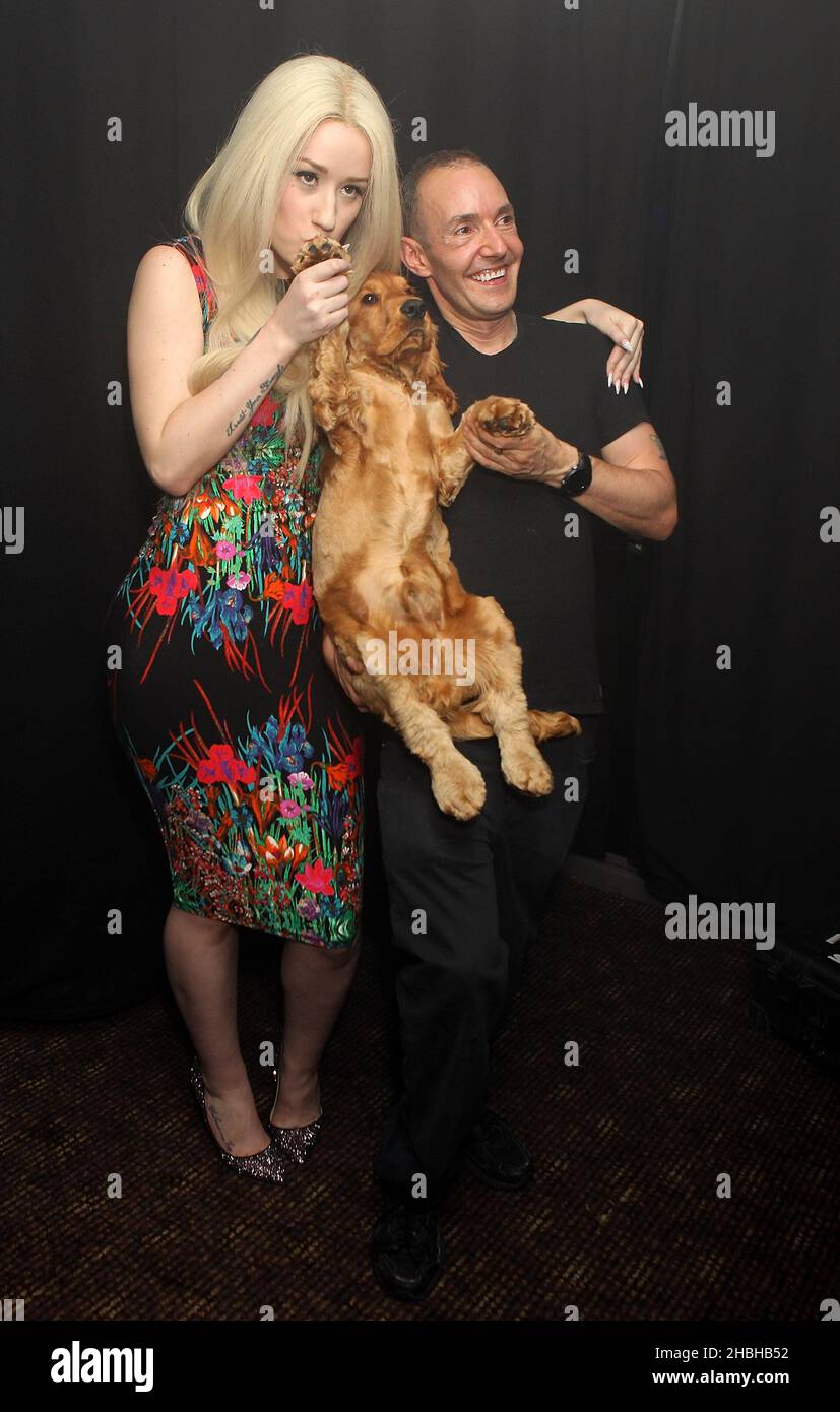 Iggy Azalea with Jeremy Joseph and his new puppy Jacob pose back stage ...
