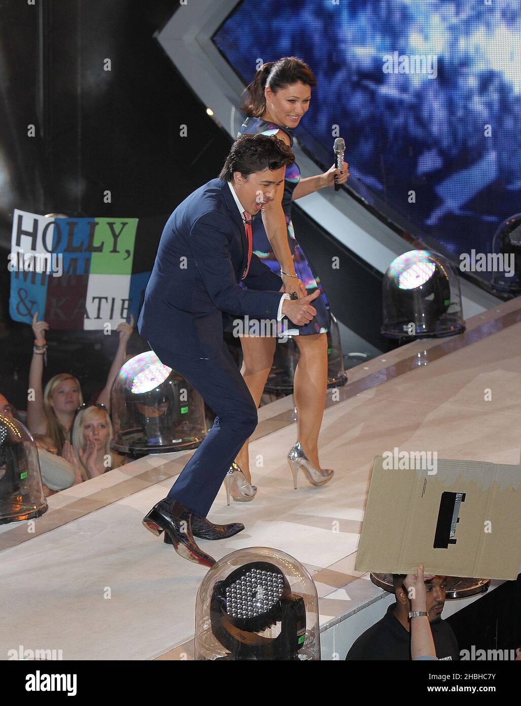 Dexter Koh pictured with Emma Willis leaves the Big Brother Final at ...