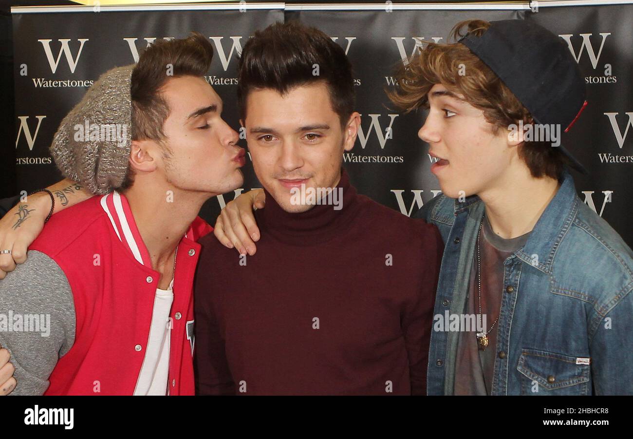 Jamie Hamblett kisses Josh Cuthbert with George Shelley of Union J at ...